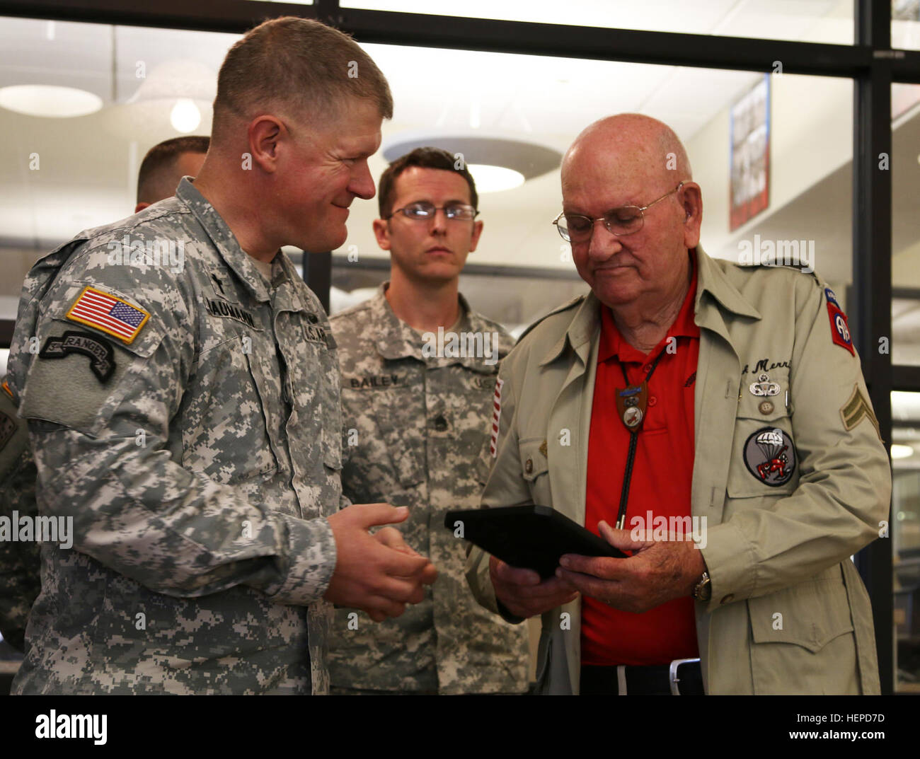 Lt. Col. Brad Baumann, chaplain, 82nd Airborne Division, presents a ...