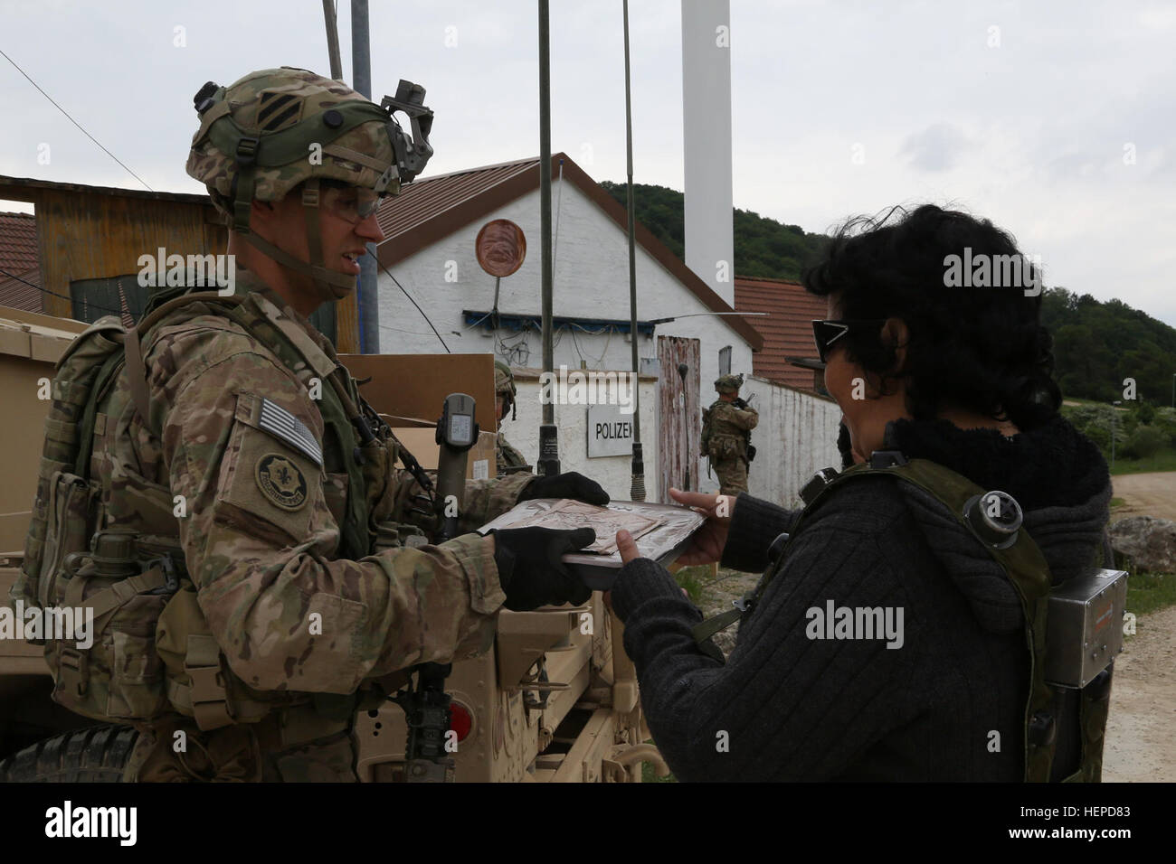U.S. Army Staff Sgt. Garrett Green, left, of Battle Company, 3rd ...