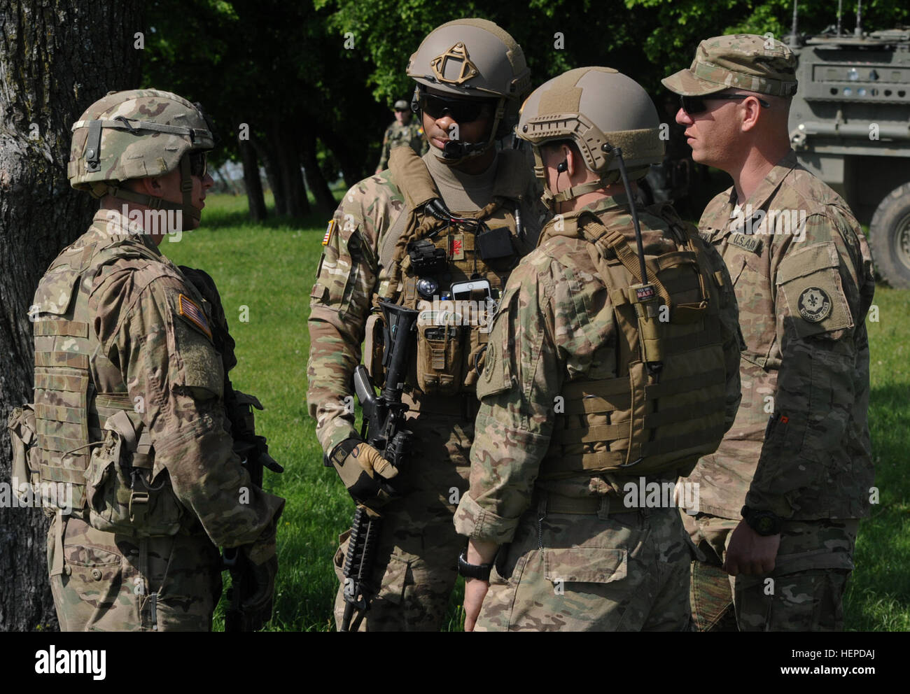 Airman 1st Class Justin D. Dixon (middle), a tactical air control party ...