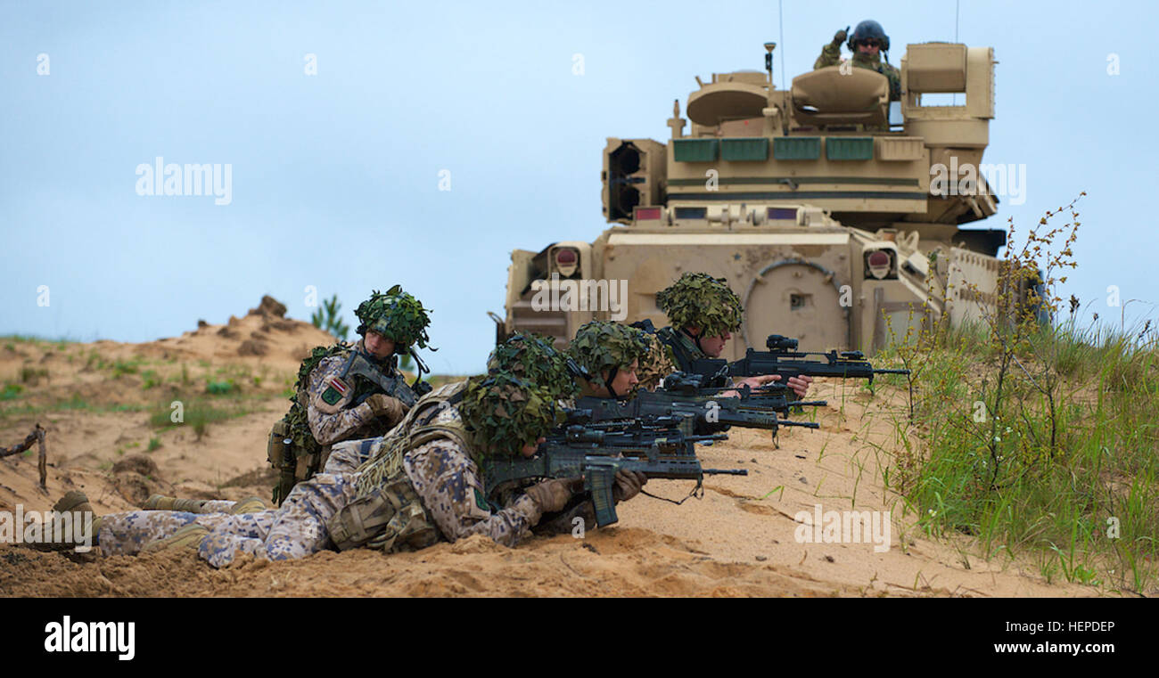 An M2 Bradley Fighting Vehicle crewman from B Company, 2nd Battalion ...