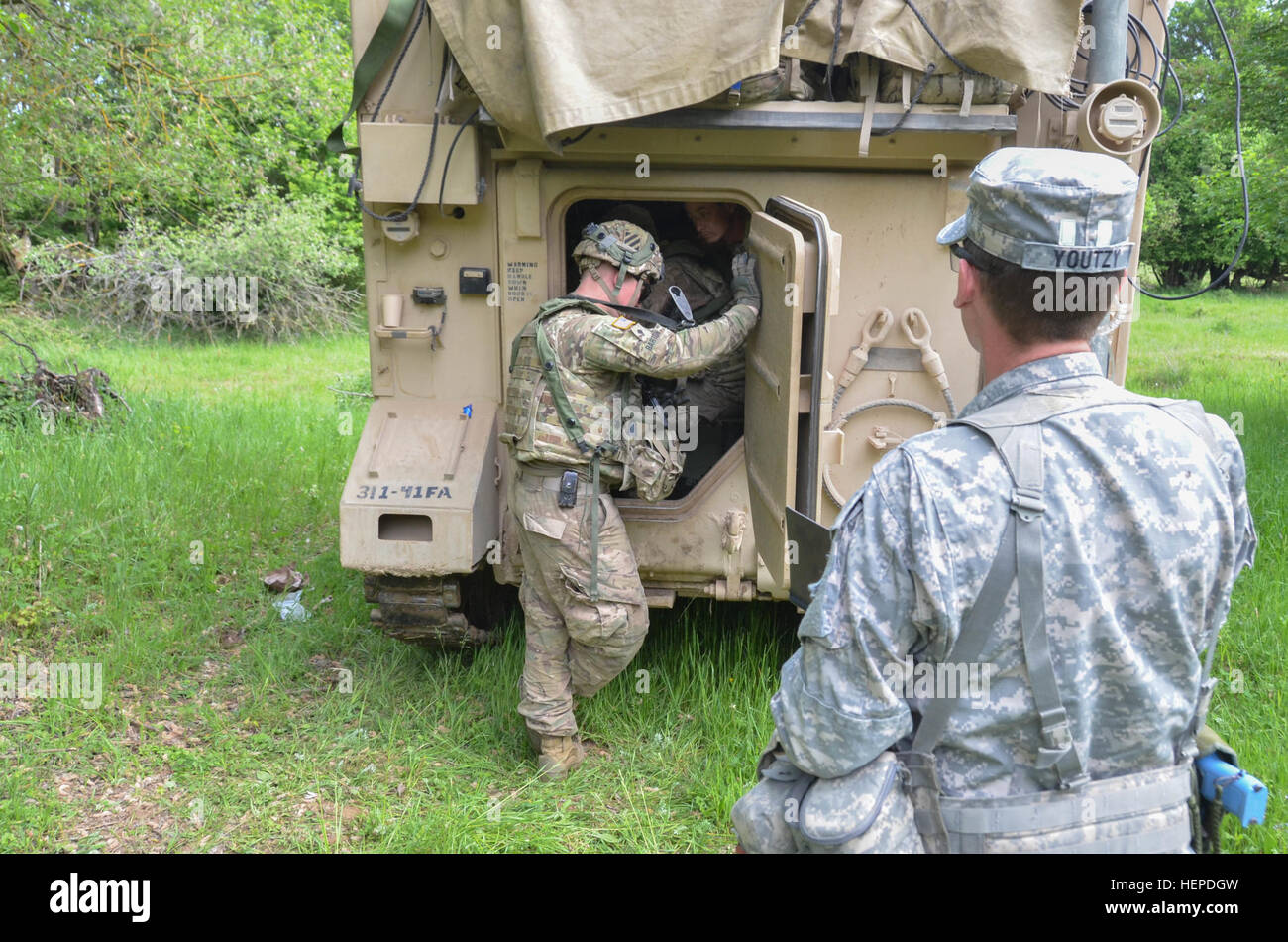U.S. Army Staff Sgt. Todd Youtzy, right, of Vampire Team, Joint ...