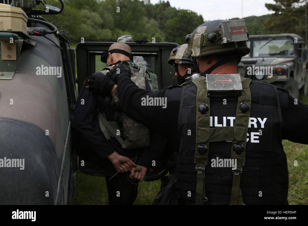 Romanian soldiers, right, of 3rd Mechanized Infantry Battalion, 61st ...