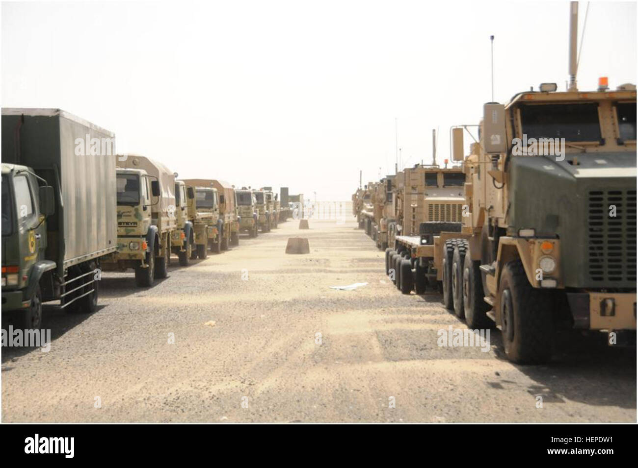 Military transportation vehicles from the Kuwaiti National Guard and ...