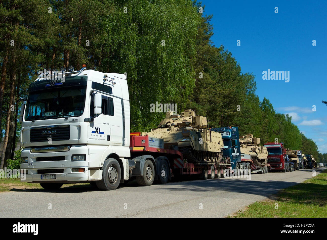 A line haul of tracked vehicles from 2nd Battalion, 7th Infantry ...