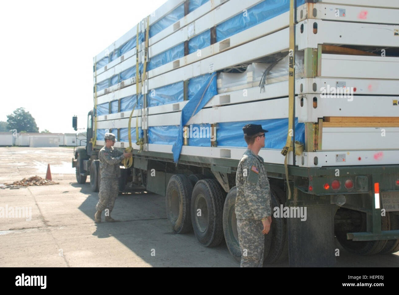 BATON ROUGE, La. ñ Two members of the Louisiana Army National Guard use ...