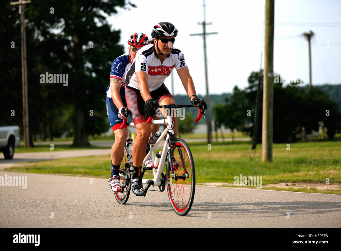 Pilot Greg Miller and U.S. Army Veteran Sean Johnson ride a tandem ...