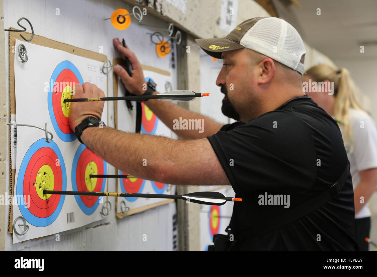 Army Veteran Frank Barroqueiro, Gainesville, Ga., counts up his score ...