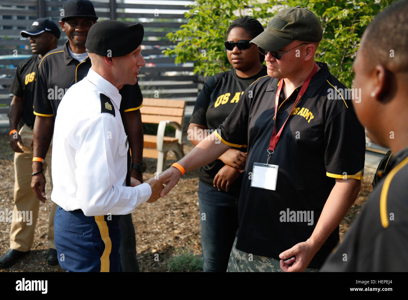 U.S. Army Sgt. Maj. of the Army, Daniel A. Dailey, shakes hands with ...