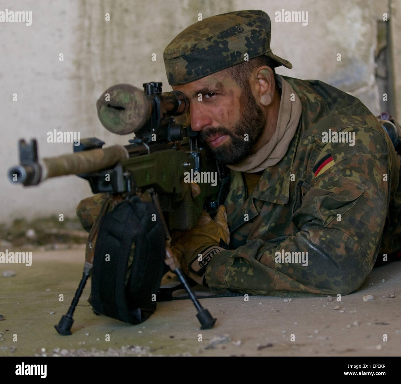 German Army Spc. Marco a sniper with Jager Battalion 292, sets sights ...