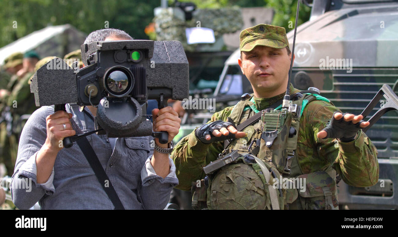 Lithuanian National Defense Force personnel demonstrate the operation ...