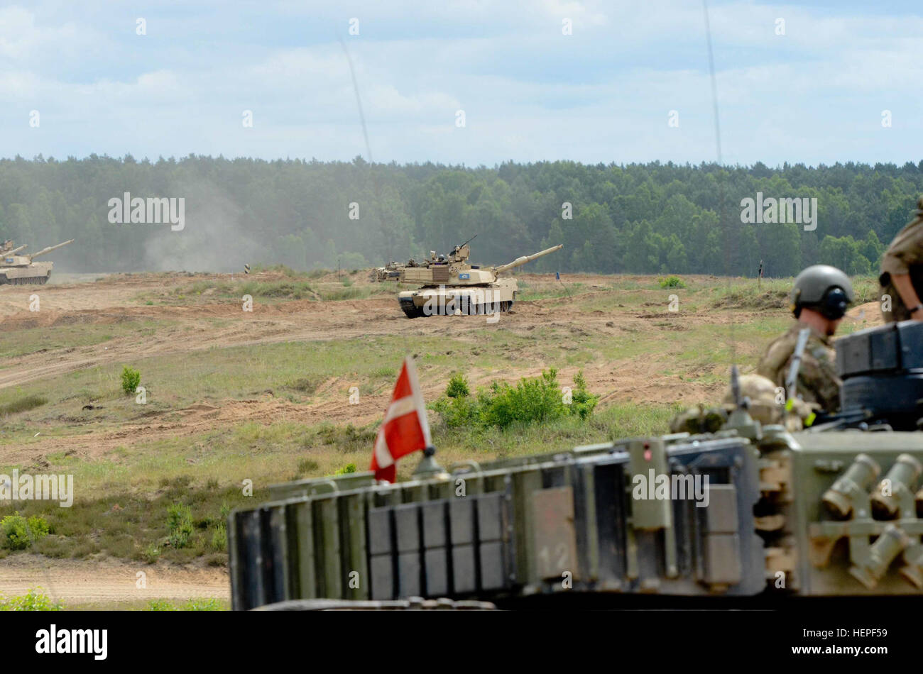 Danish soldiers of the Dragoon Regiment, 1st Armored Battalion, 1st ...