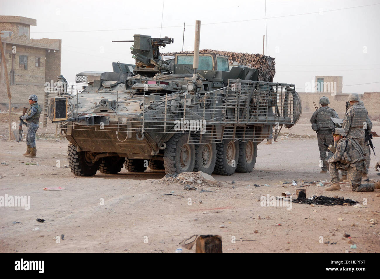 Soldiers from Company A, 1st Battalion, 27th Infantry Regiment "Wolfhounds," 2nd Stryker Brigade ...
