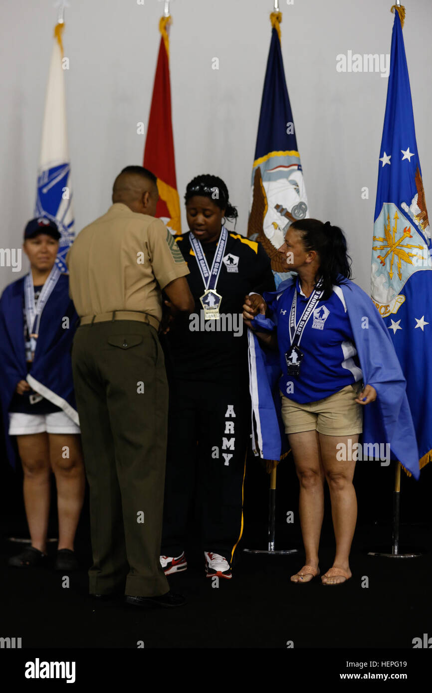 U.S. Army Cpl. Jasmine Perry , Fort Campbell, Ky., receives the gold ...
