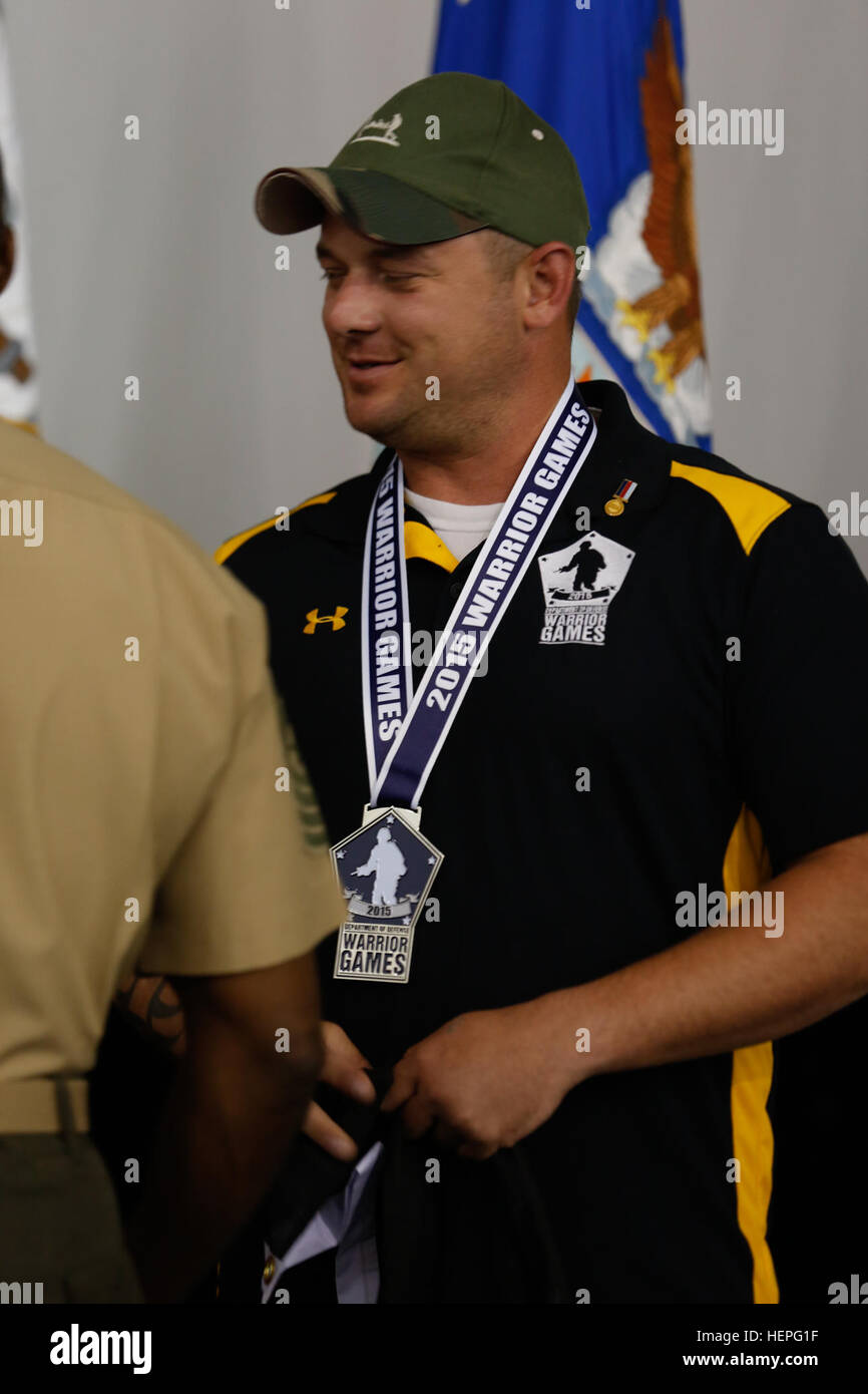 U.S. Army Sgt. Patrick Timmins, Colorado Springs, Colo., receives the ...