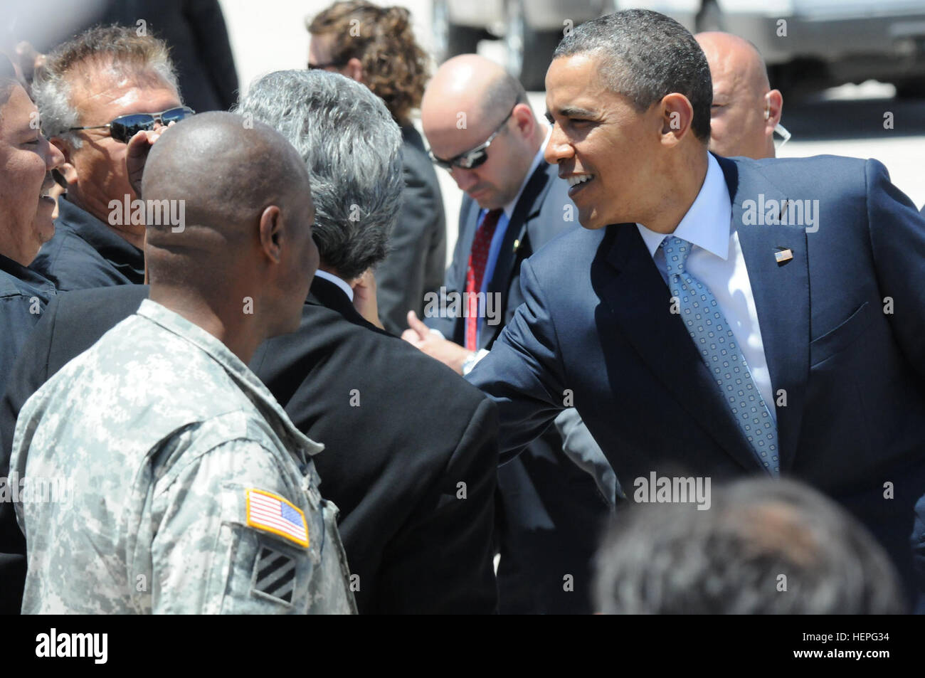 President Barack Obama greets soldiers and civilians, after arriving on ...