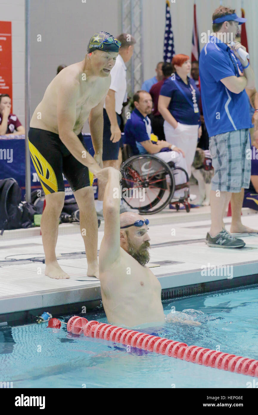 U.S. Army Cpl. Matthew Mueller (top), Fort Carson, Colo., and U.S. Army ...