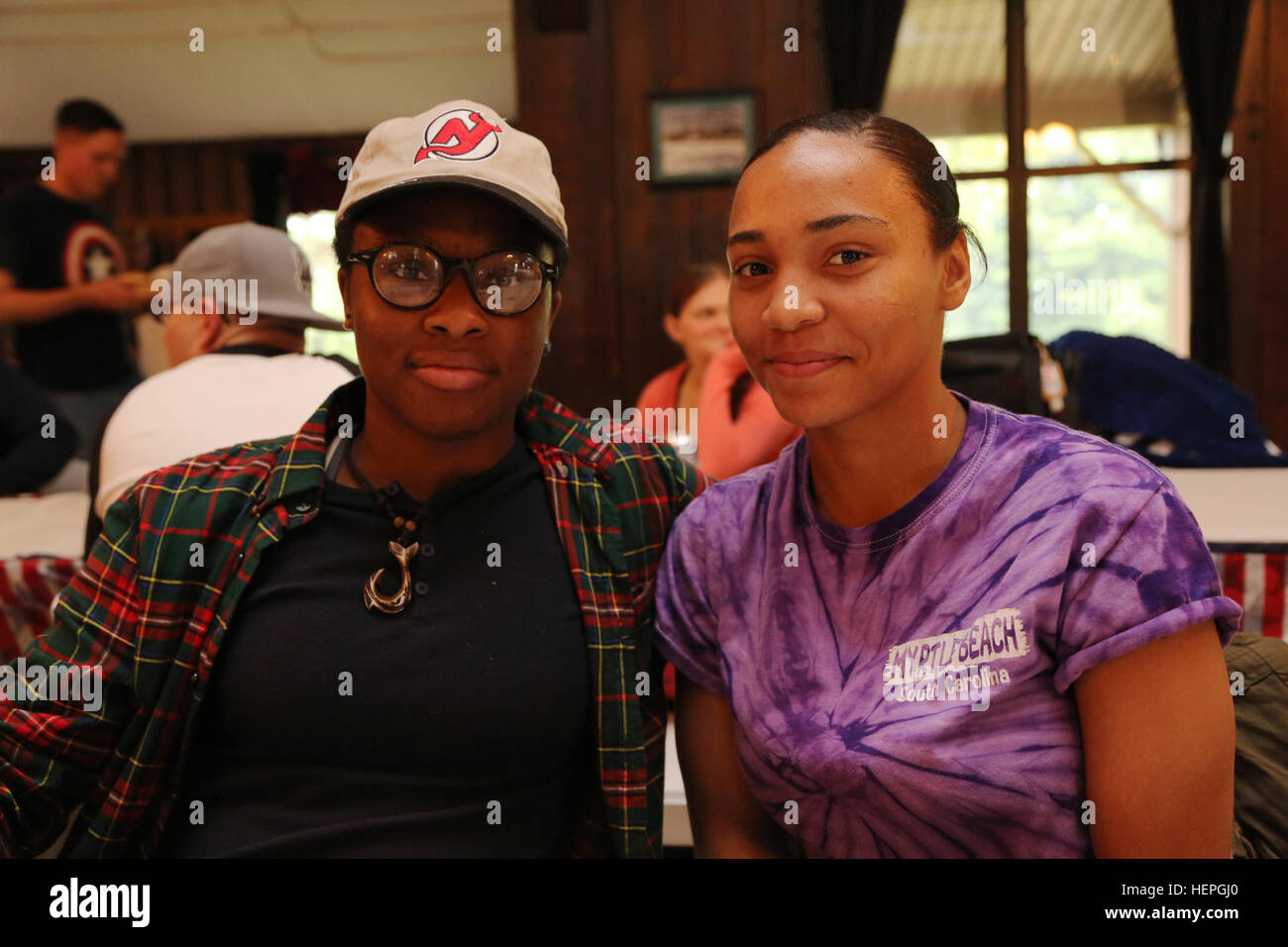 Maria Young poses for a photo with her spouse U.S. Army Pfc. Tianna ...