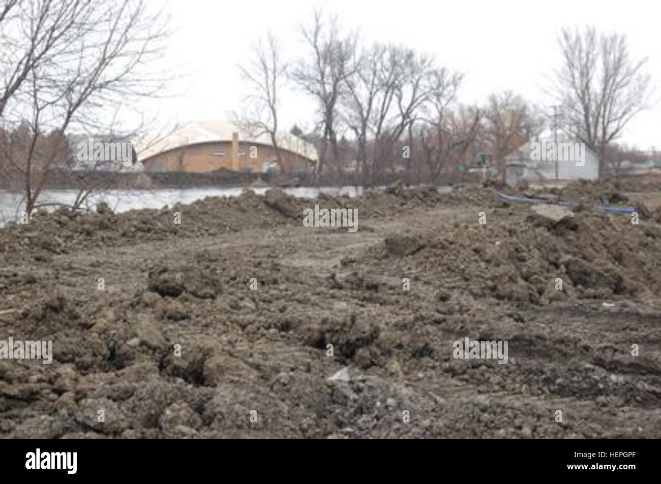 Staff Sgt. Nathan Sather’s backyard is filled with clay and sand after ...