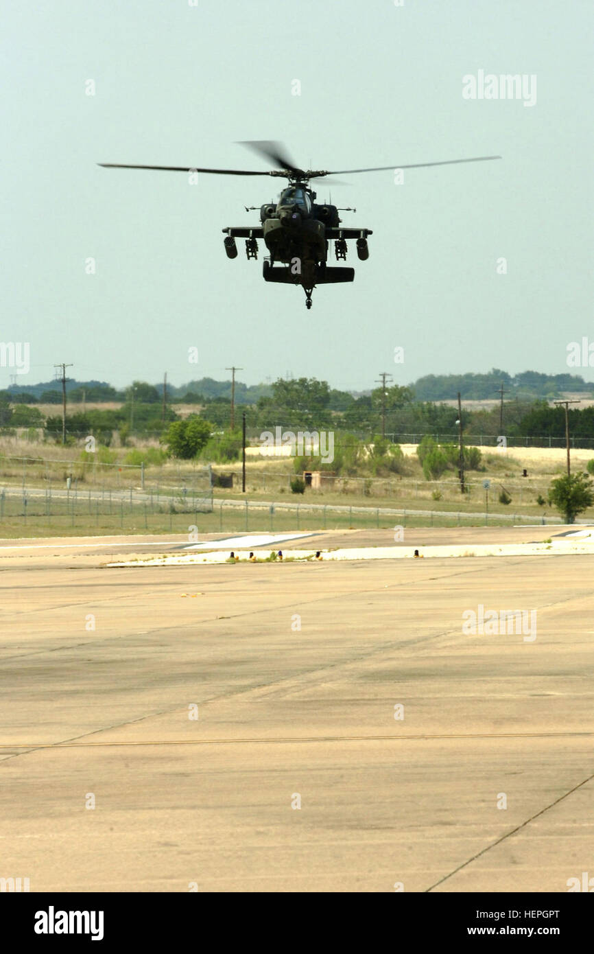 Although the AH-64D Apache helicopter's engines are loud as it comes in ...