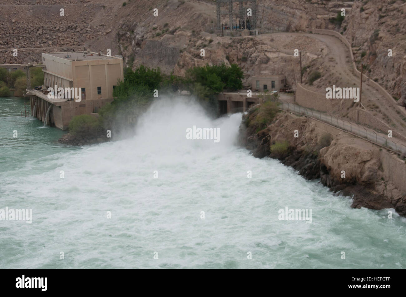 Water exits the Kajaki Dam power house in early April 2012. (USACE ...