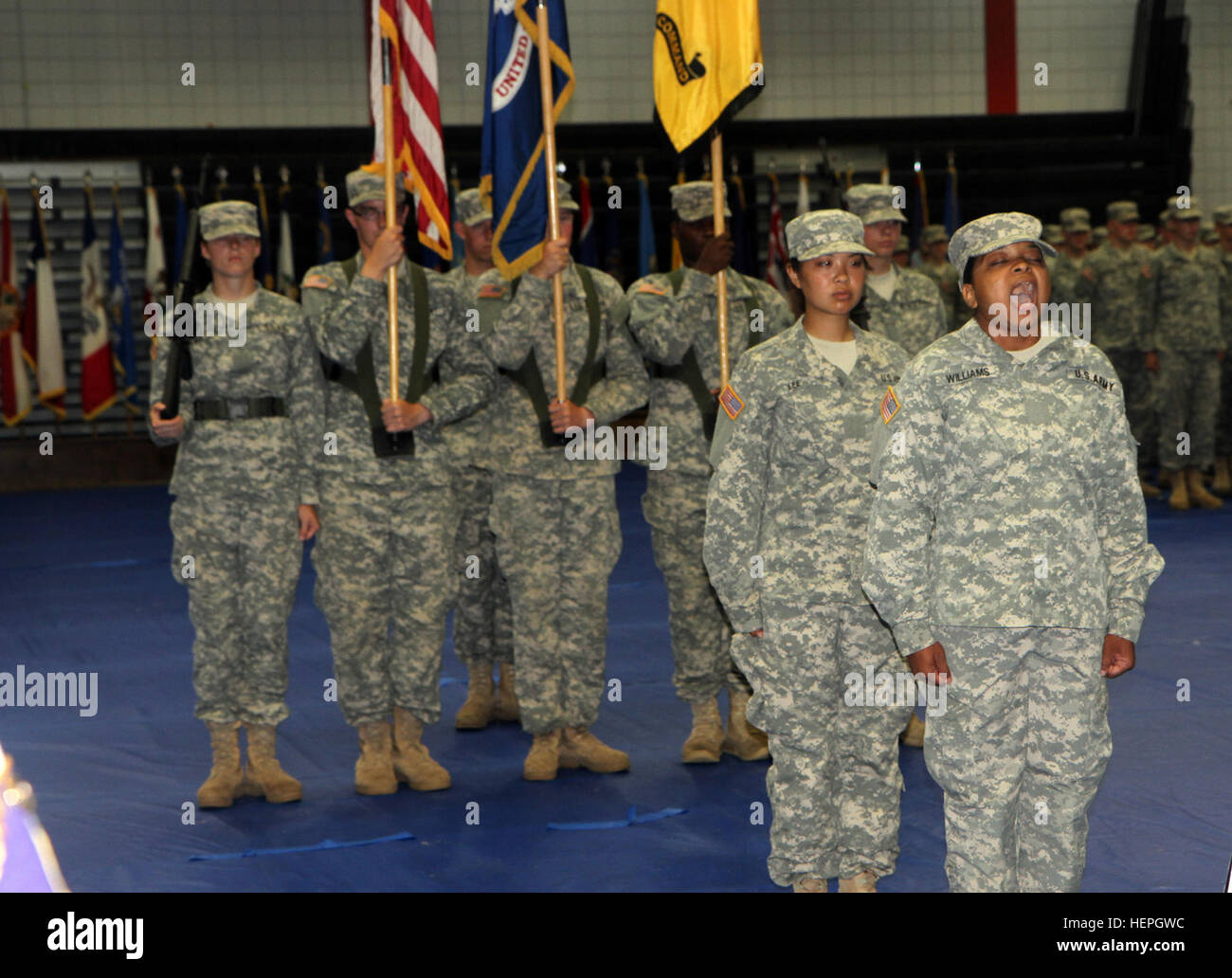 A graduating cadet recites the Cadet's Creed during a graduation ...