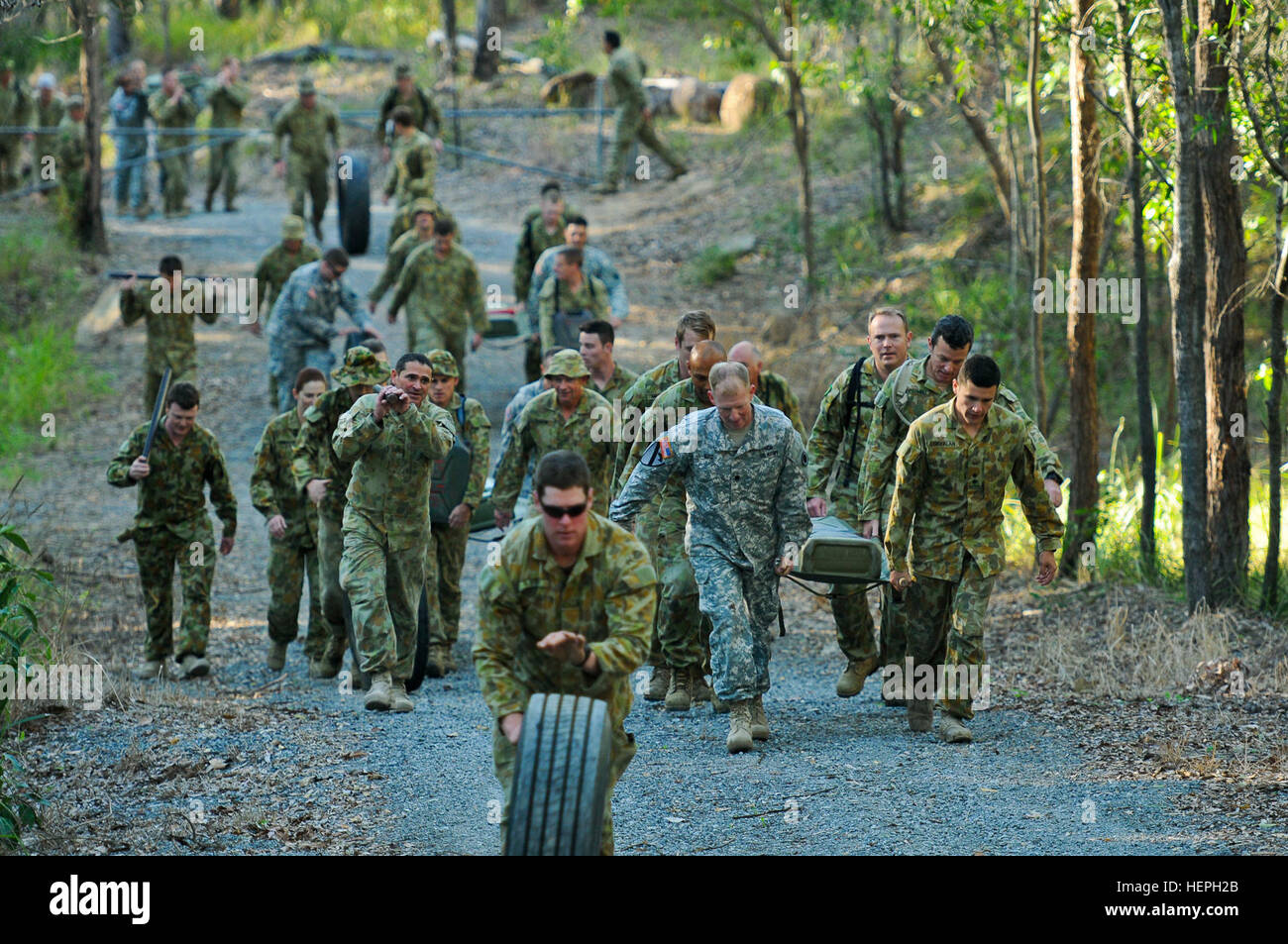I Corps and 1st Signal Regiment, Australian army, soldiers carry three ...