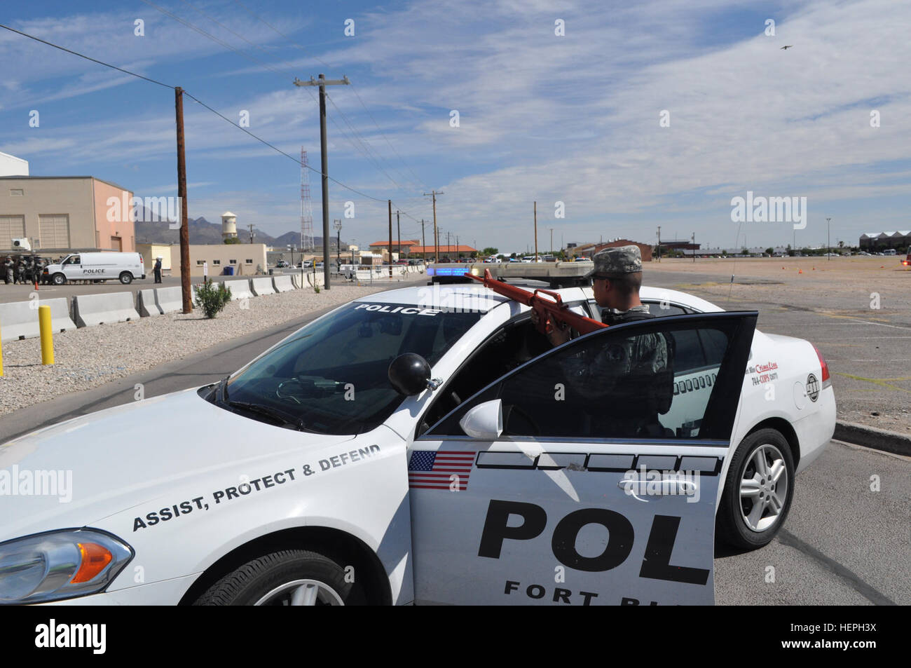 A Military Police officer maintains the perimeter established at the ...