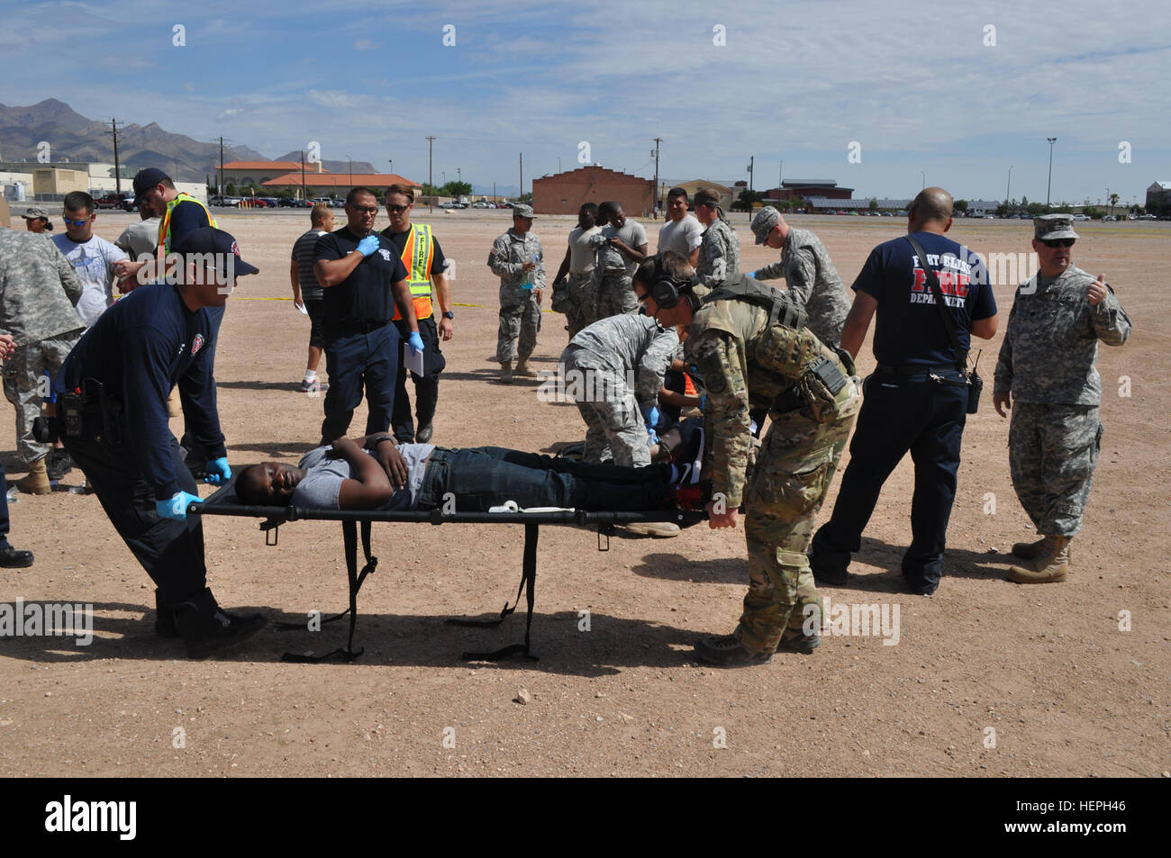 First responders bring the first casualties to the triage site for ...