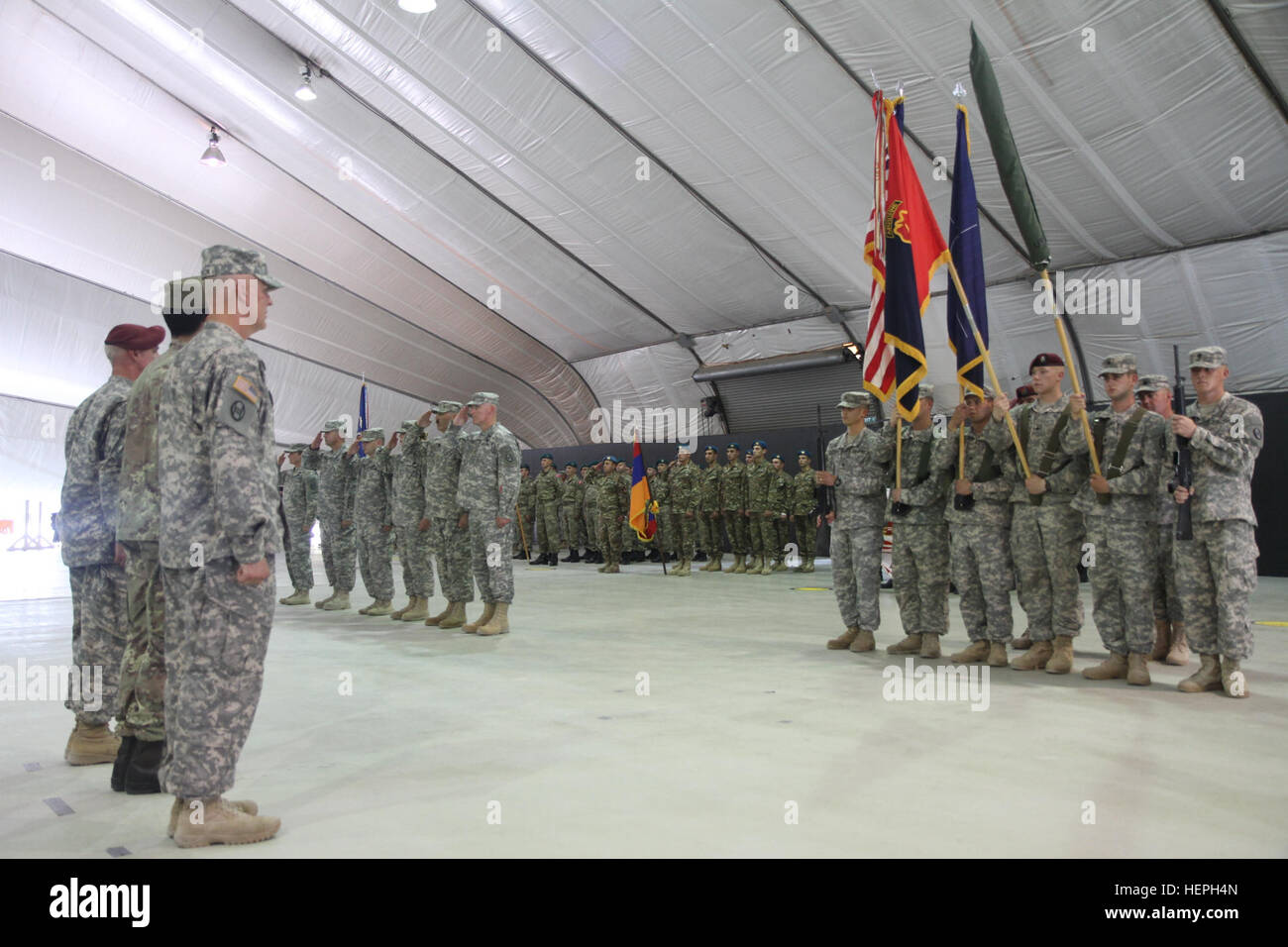 A U.S. Army color guard presents the colors for the United States; NATO ...