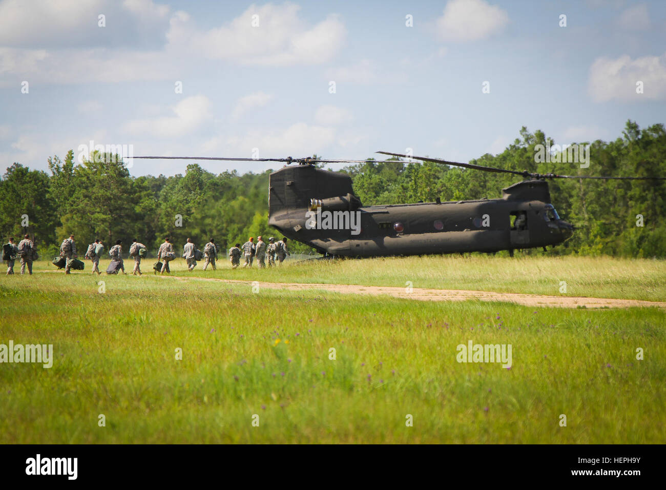 Soldiers of the 155th Headquarters Headquarters Company travel back ...