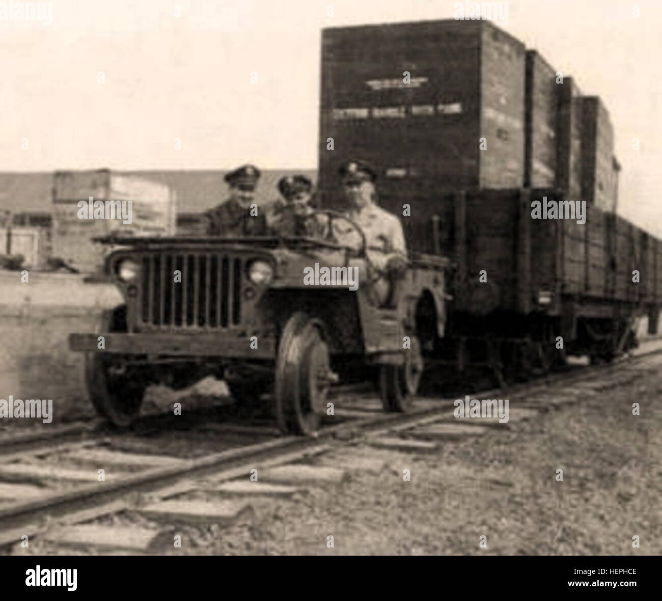 Jeep switcher with flatbed trailer (cropped Stock Photo - Alamy