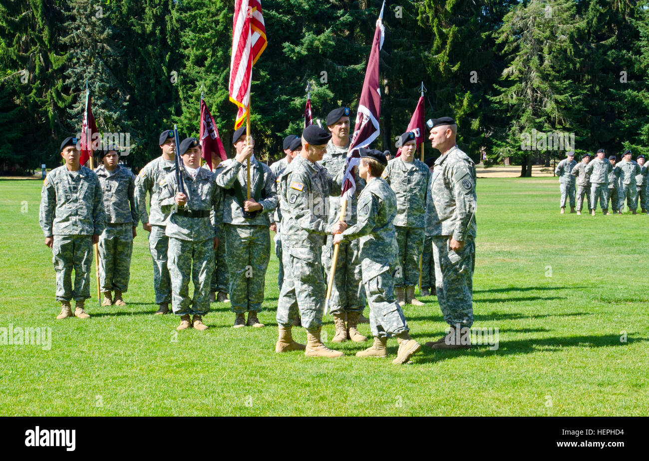 Lt. Col. Terrell G. Morrow, Warrior Transition Battalion’s incoming commander, left, receives ...