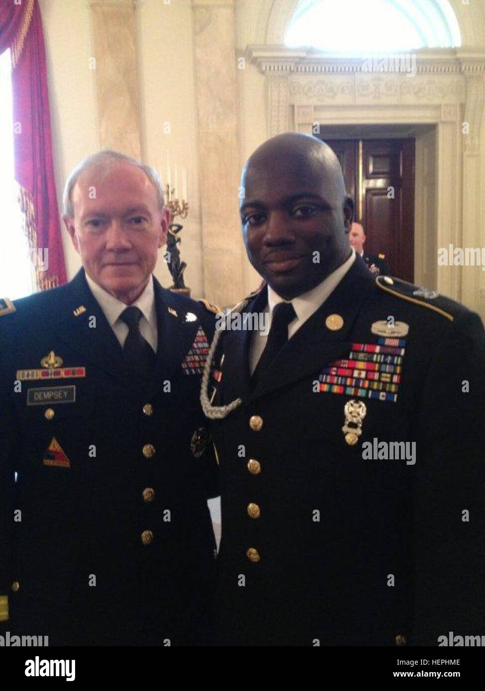 Sgt. 1st Class Rodney Harris, right, an observer controller/trainer in ...