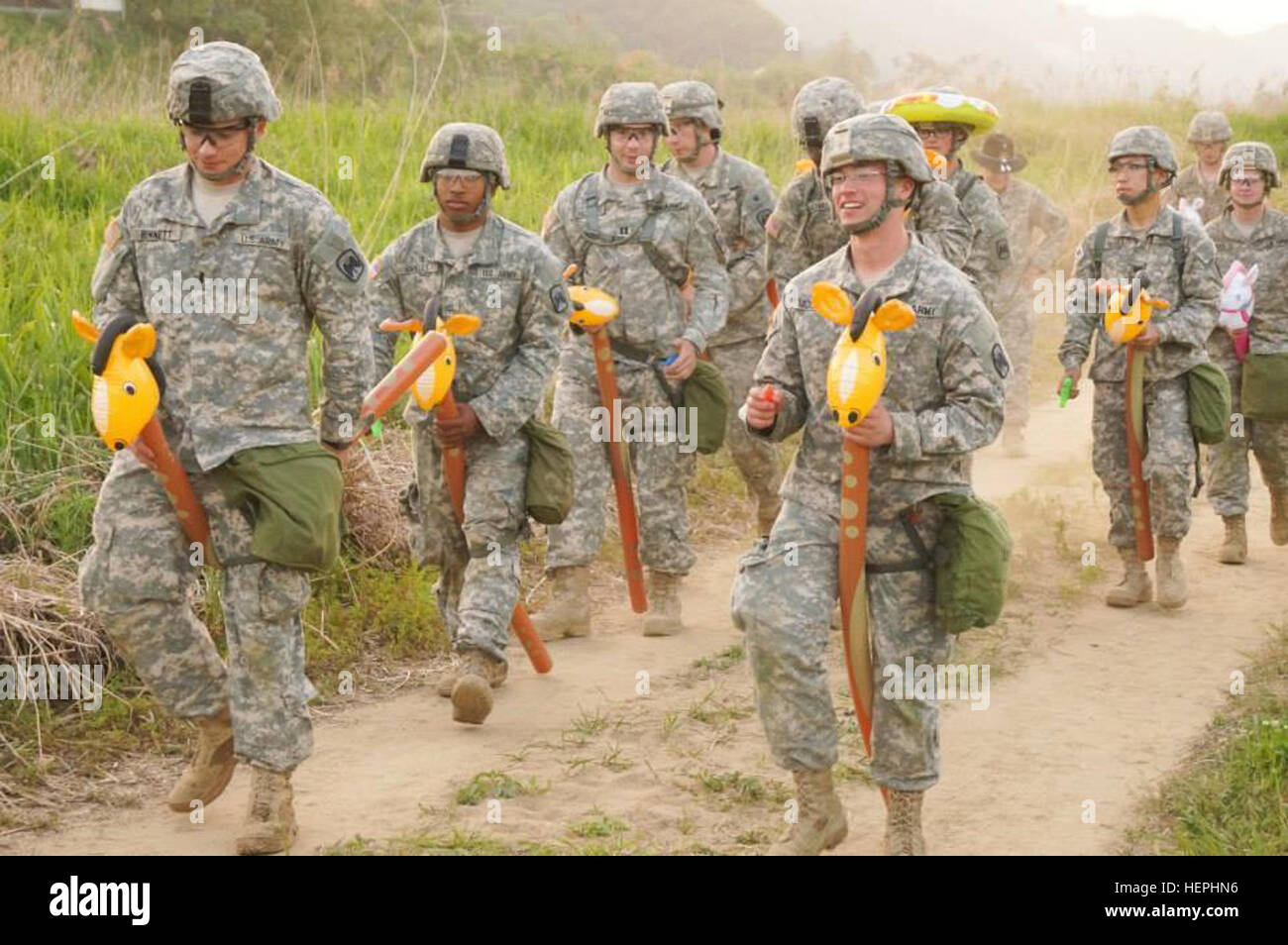 Soldiers participate in the battalion Spur Ride at Camp Humphreys ...