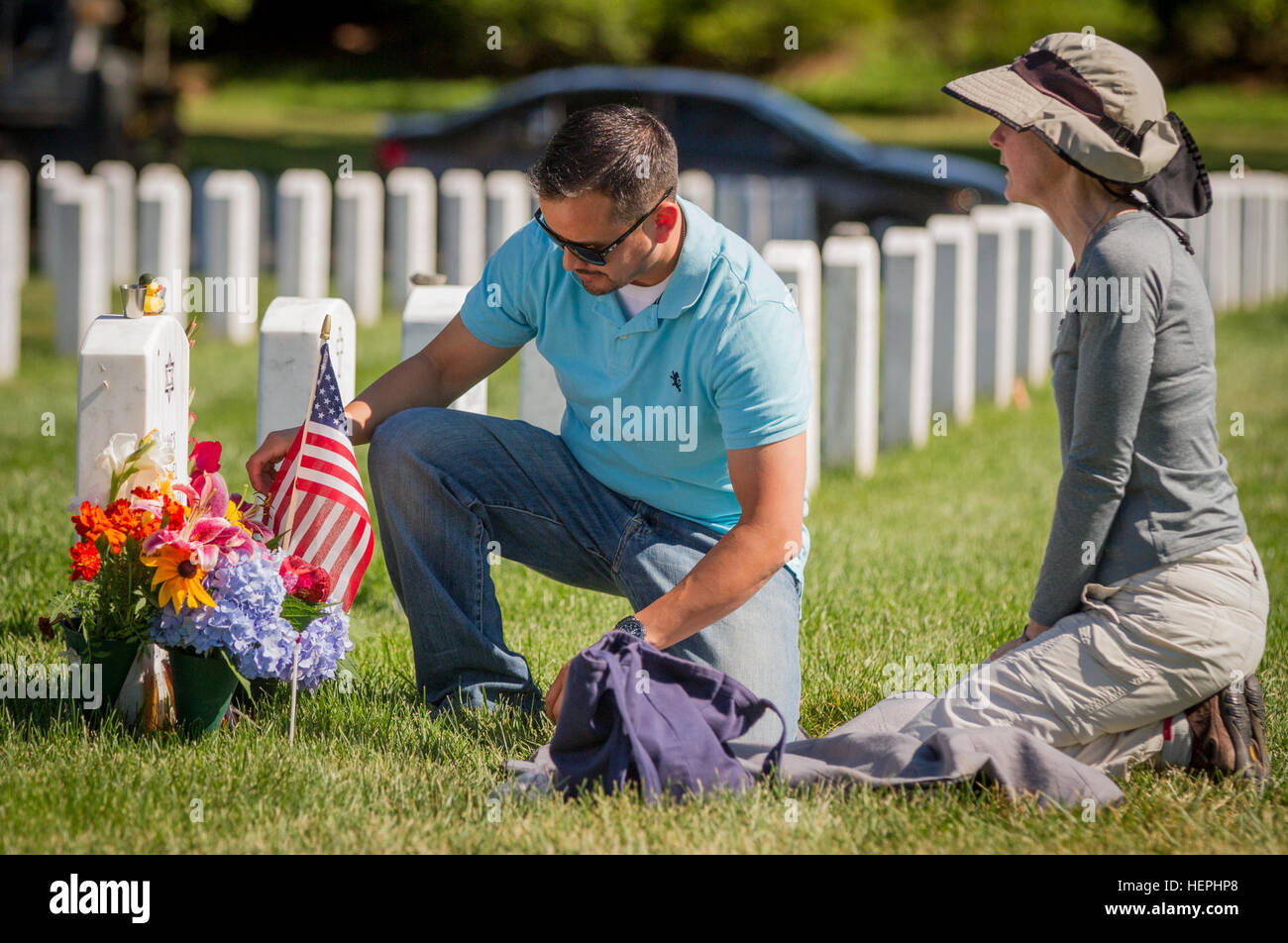Alison Malachowski tends to the grave of her son, U.S. Marine Corps ...
