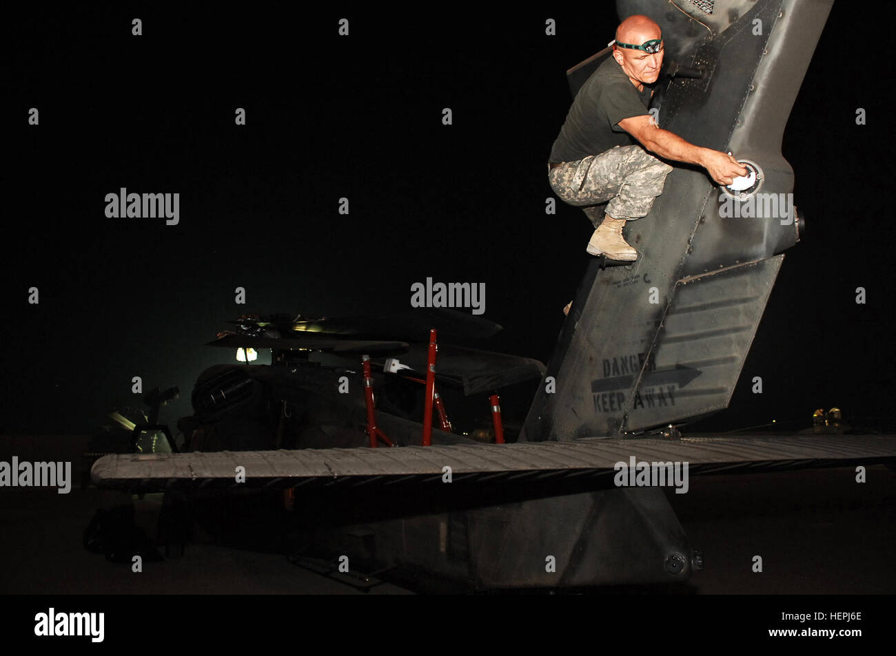 U.S. soldiers conduct port operations as UH-60 Black Hawk helicopters ...