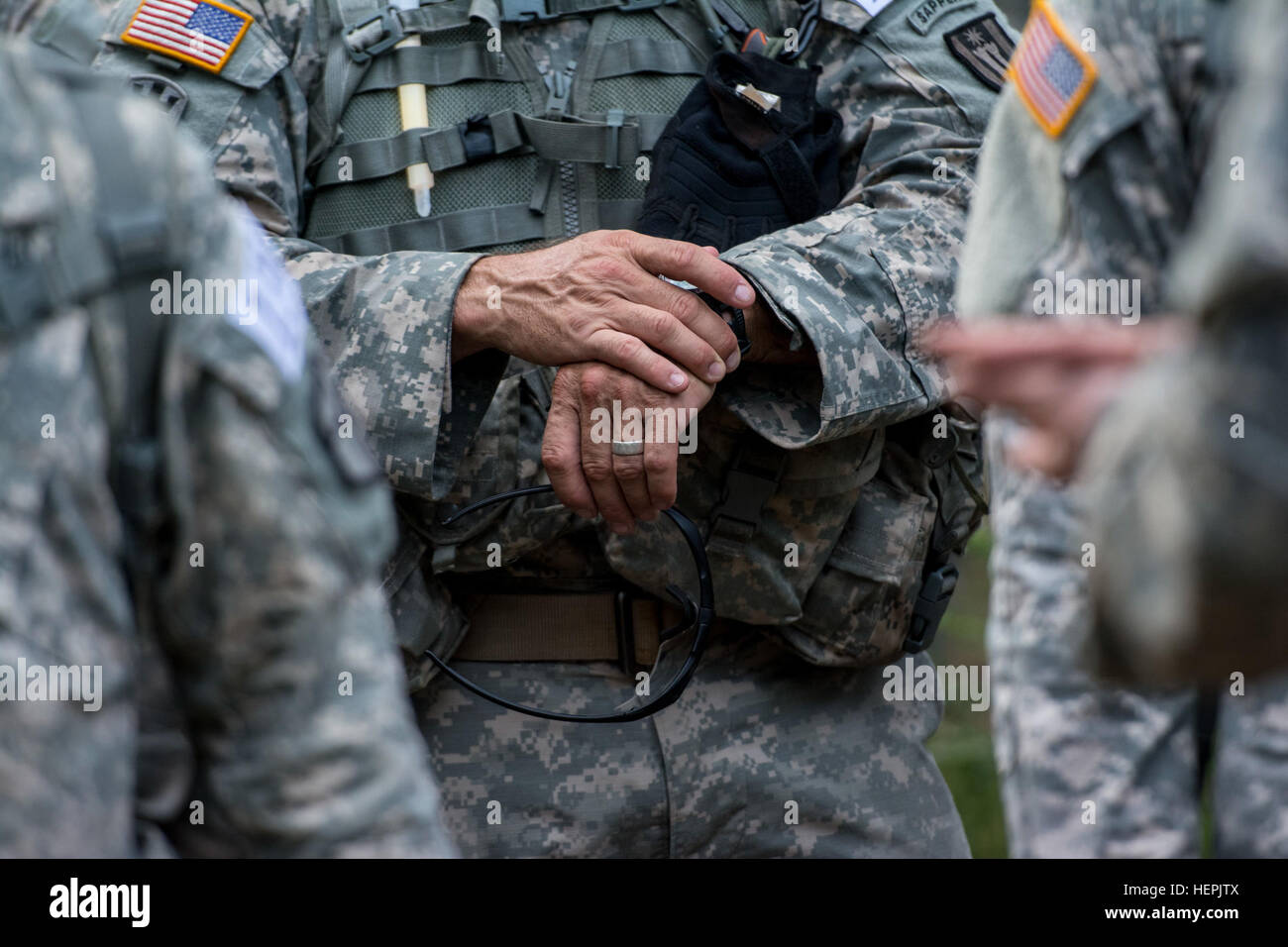A U.S. Army Reserve noncommissioned combat engineer officer sets his ...