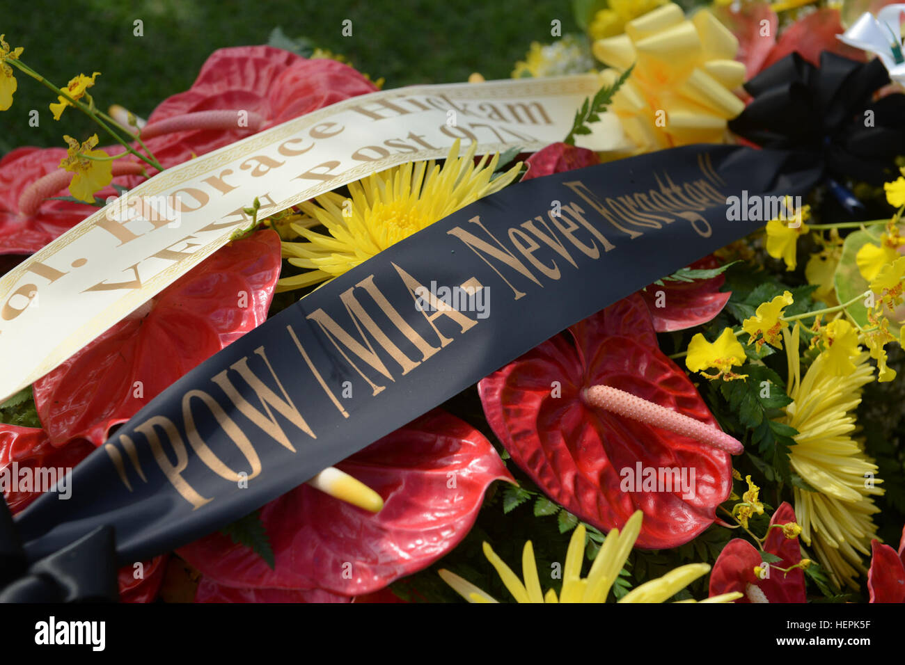 A flower arrangement from Veterans of Foreign Wars Post No. 970 lays ...