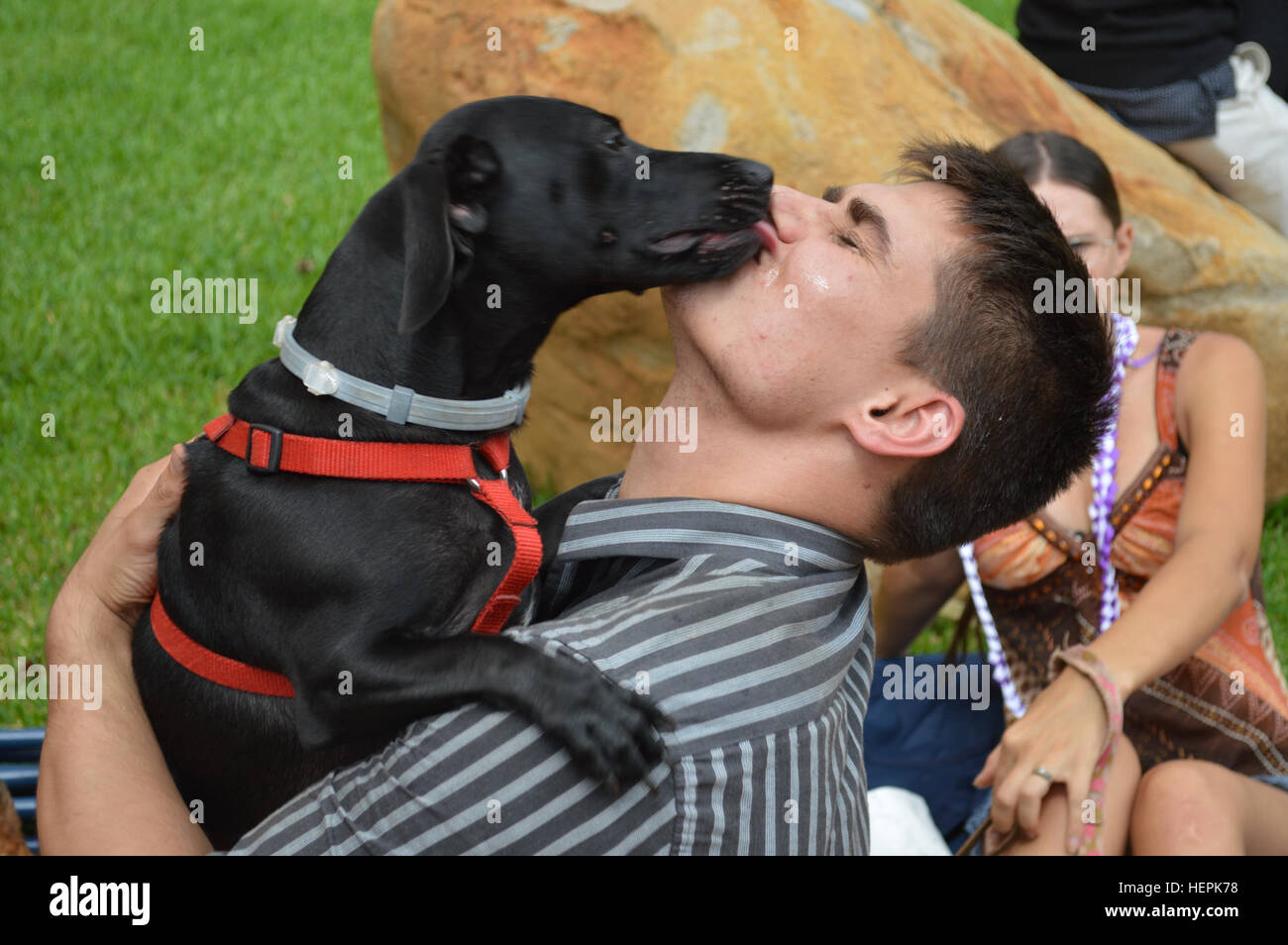 Spc. Justin Lowery reunites with his over-eager dog, Dakota, after ...