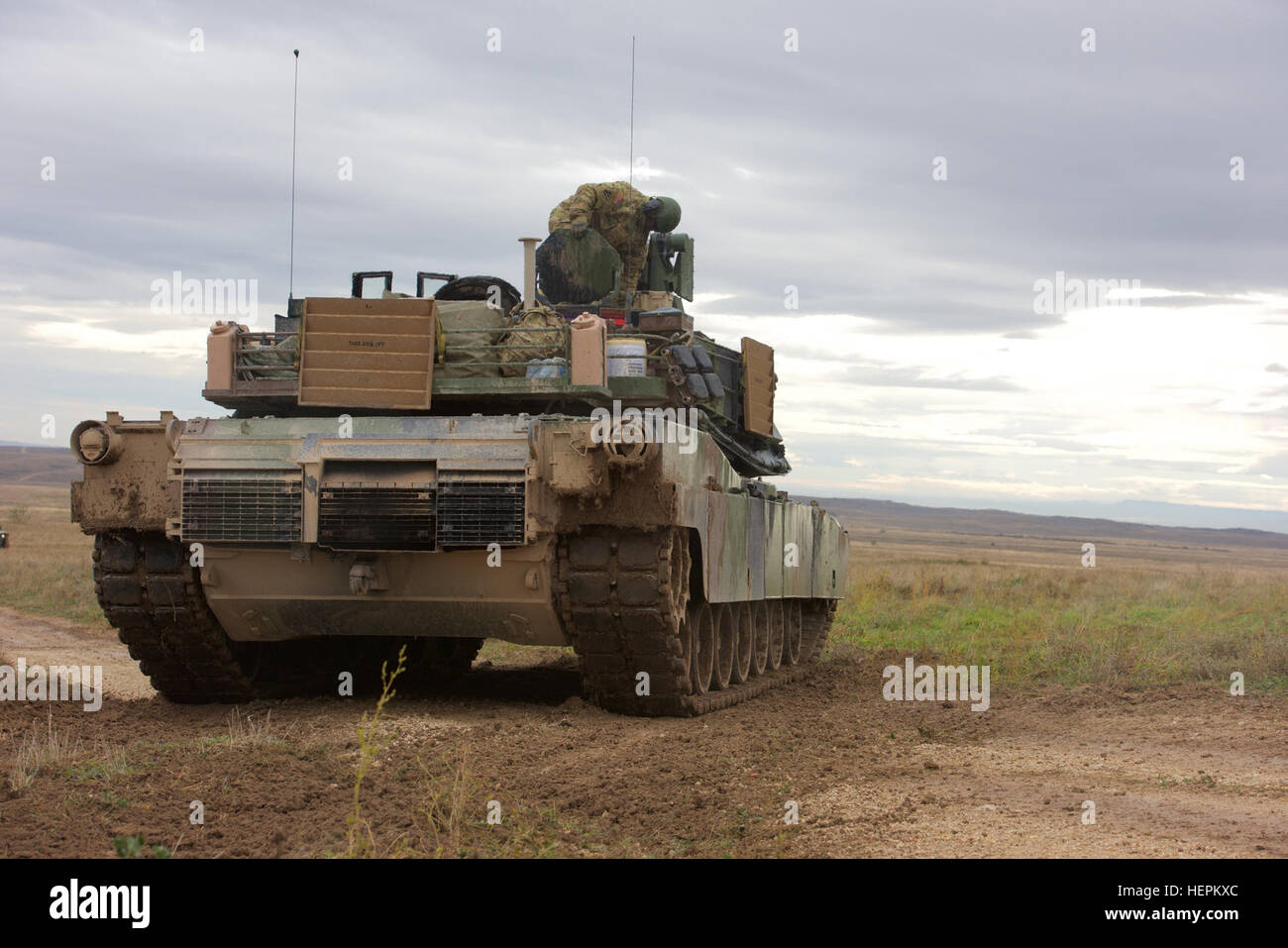 An Abrams Battle Tank .50-caliber gunner assigned to Charlie Company ...