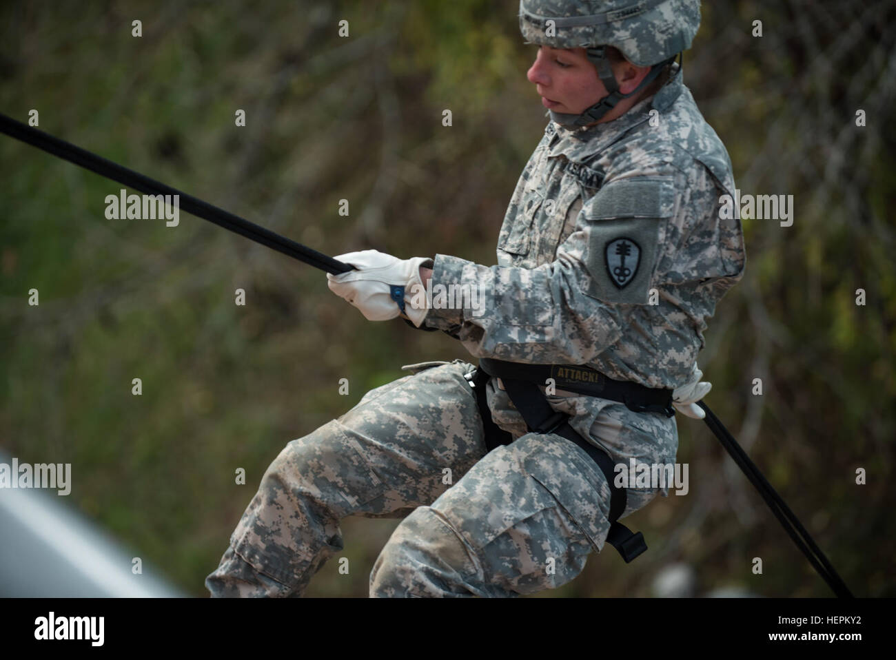 A U.S. Army Reserve military police Soldier rappels down a 40-foot ...
