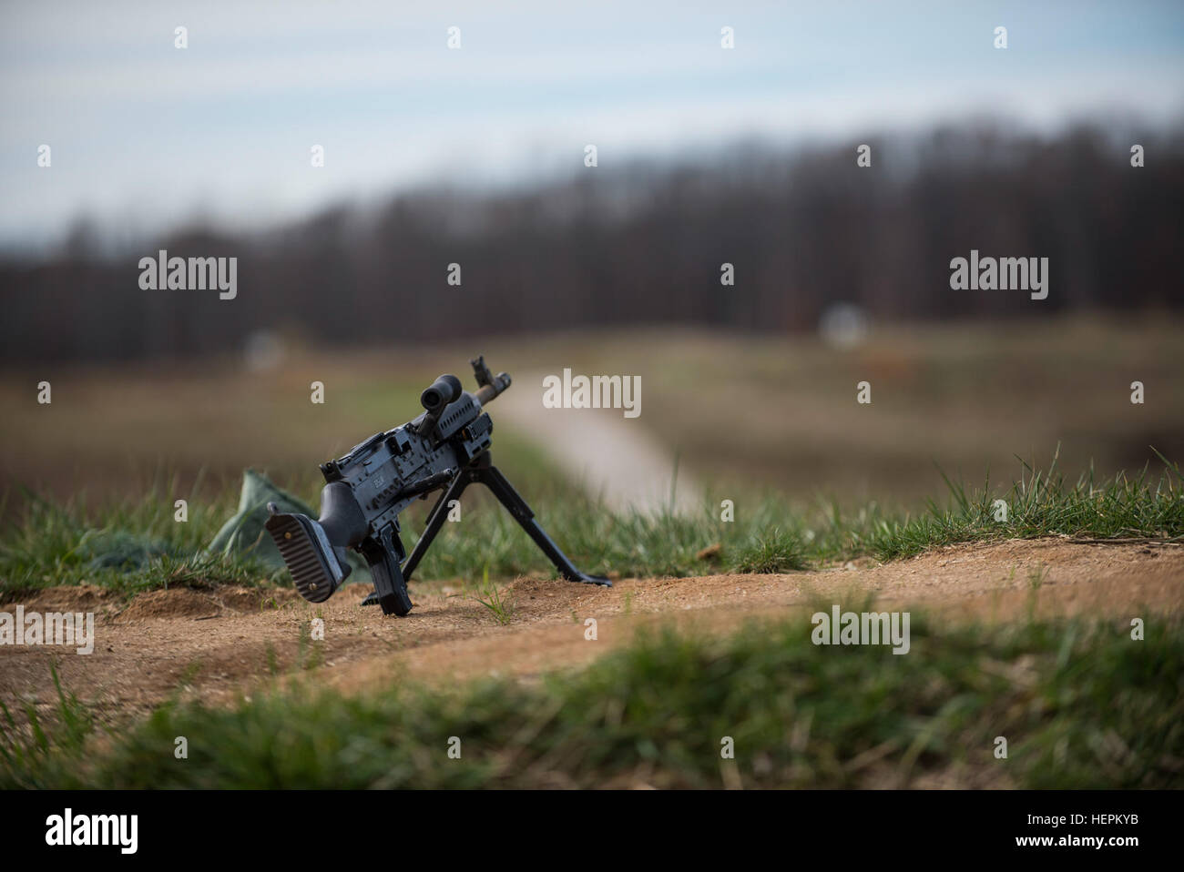 An M240B machine gun rests on a berm before a qualification range for a ...