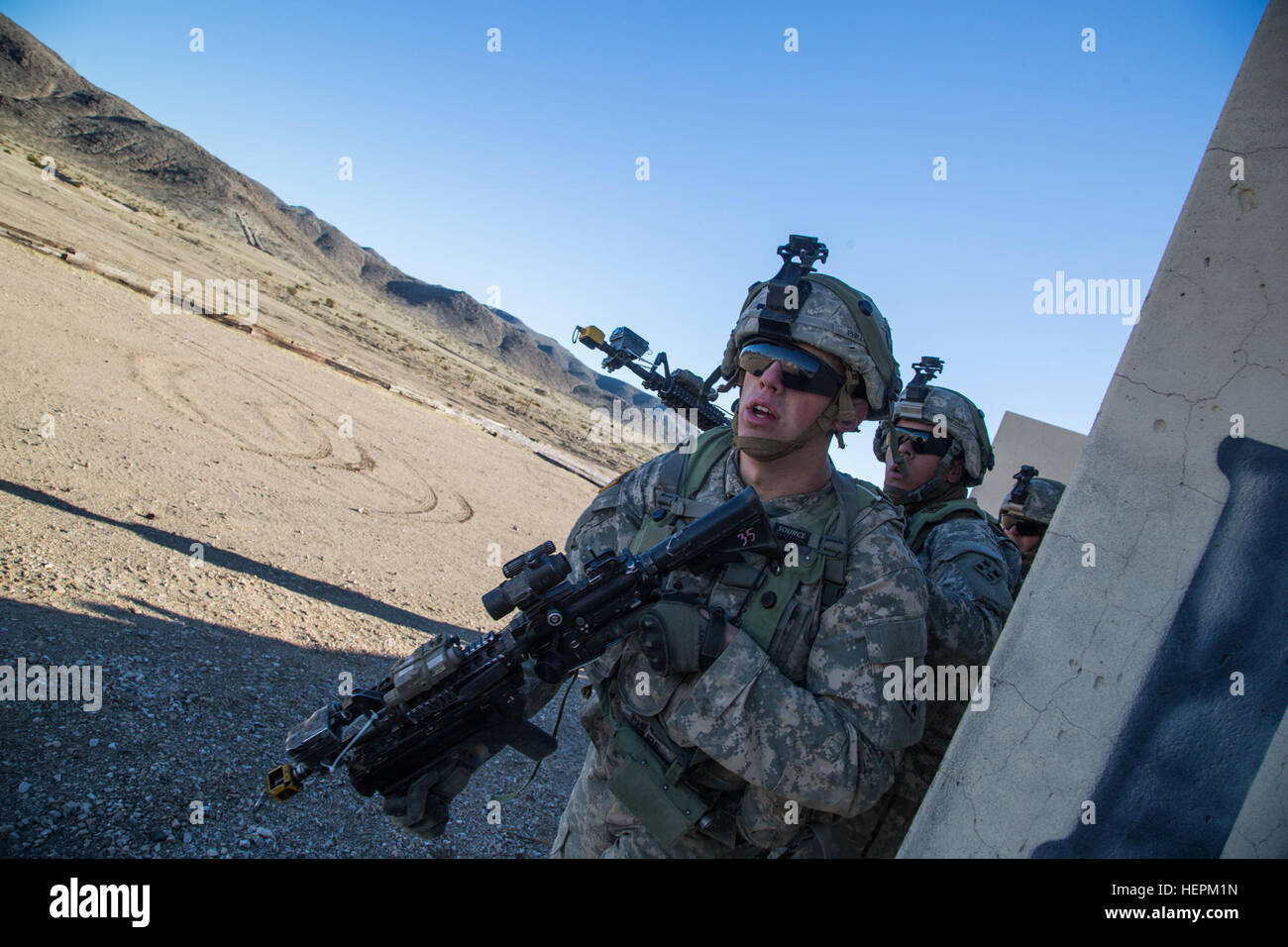 U.S. Army infantry units conduct assault on enemy compounds during ...
