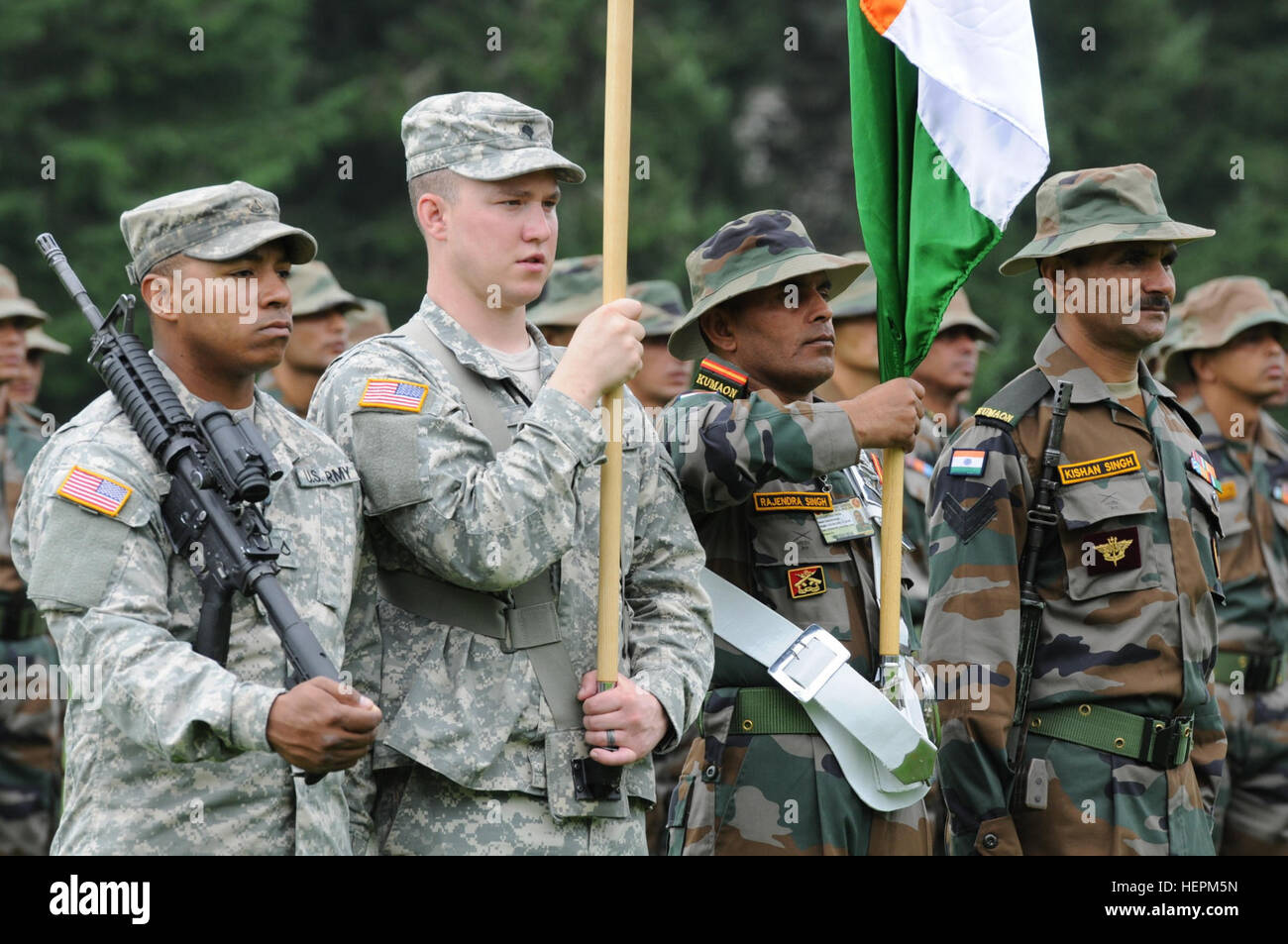 The U.S. and Indian Army color guard stand together during the opening ...
