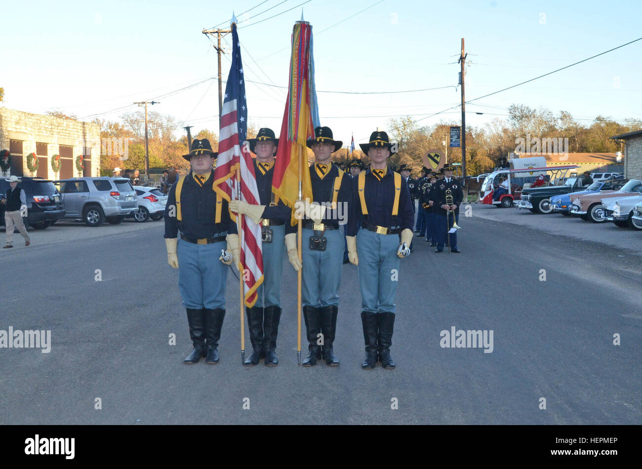 The 1st Cavalry Division Color Guard prepares to march in the 15th ...