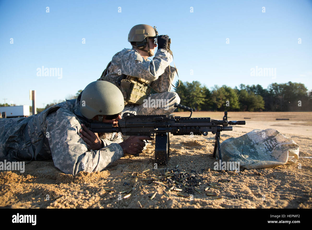 Soldiers from the 55th Signal Company conduct a heavy weapons range at ...