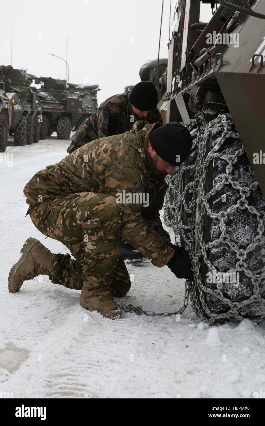 Slovenian soldiers of 1st Brigade, 10th Infantry Regiment install snow ...