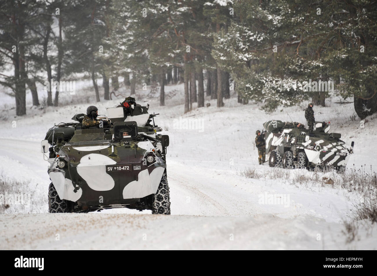 Slovenian soldiers of 3rd Company, 10th Regiment maneuver Valuk Light ...