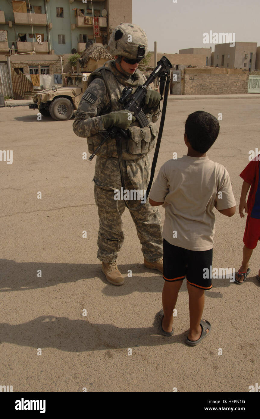 U.S. Army Pvt. Christopher Seymour, a native of Syracuse, N.Y., chats ...