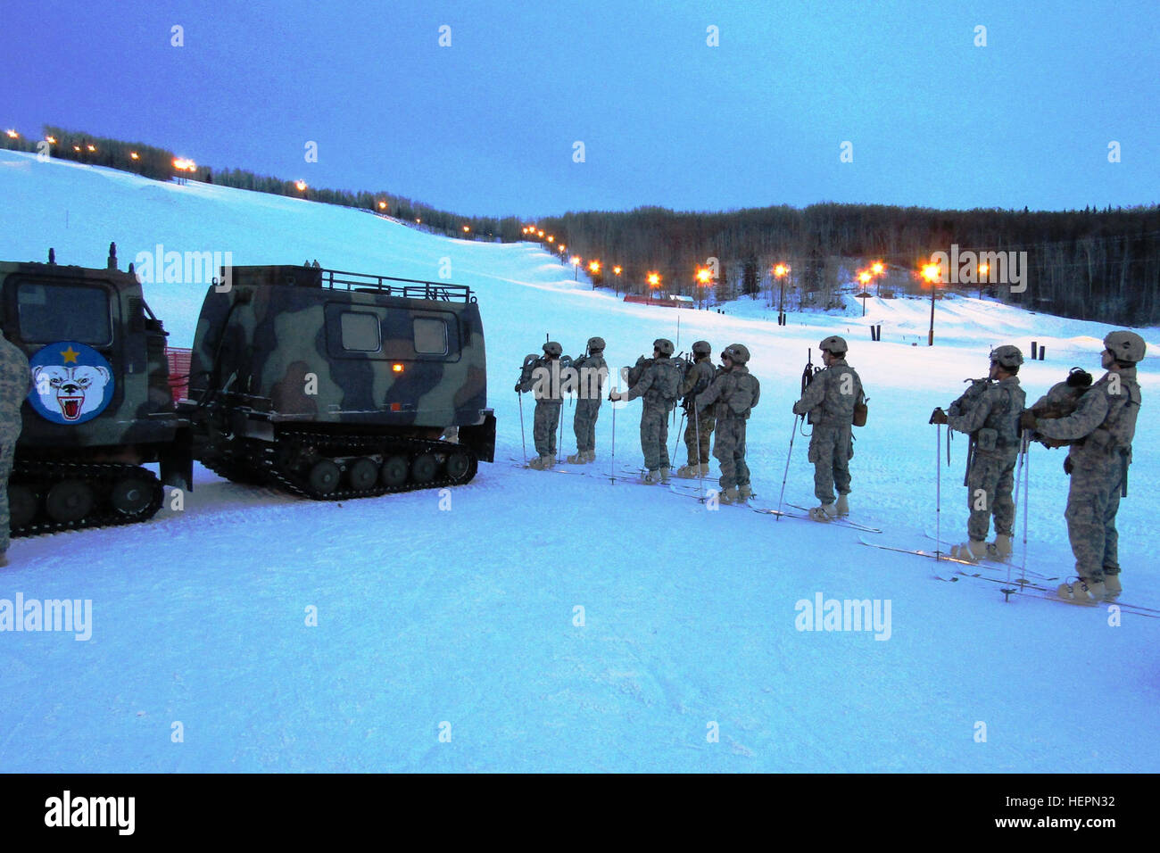 U.S. Army Alaska Soldiers wait to board the ski lift at the bottom of ...